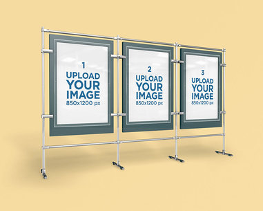 Placeit - Mockup of Three Poster Displays Featuring a Solid Color Backdrop