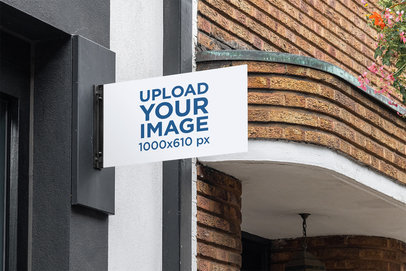 Placeit - Mockup of an Outdoor Sign Placed on a Minimalist Store Facade