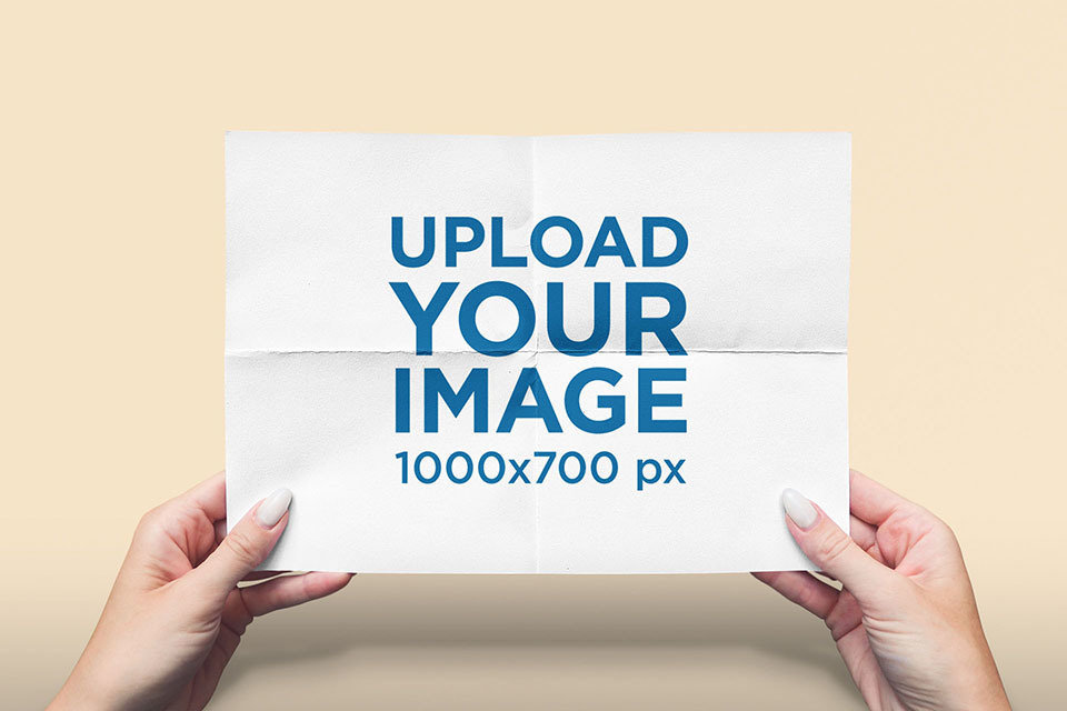 Placeit - Mockup Featuring Two Hands Holding a Horizontal Flyer Against ...