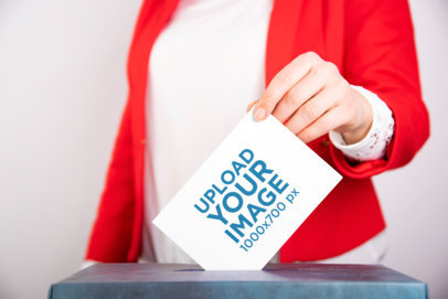 Placeit - Mockup of a Woman Putting Her Ballot in the Box