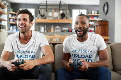 Placeit - T-Shirt Mockup of Two Men Playing Video Games at Home