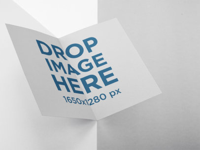 Placeit - Floating Open Booklet Mockup Against a Bicolor Background