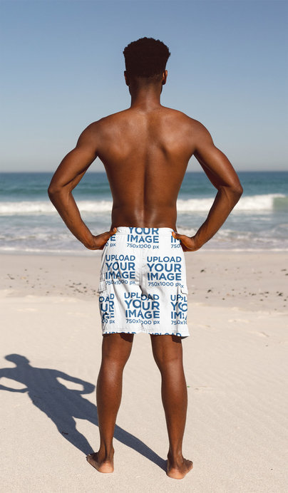 Placeit - Back-View Swim Trunks Mockup Featuring a Man Standing at the ...