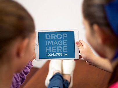Placeit - Two Little Girls Using an iPad Mini in Landscape View Mockup ...